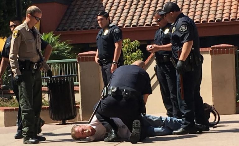 Man attempts to set self on fire in protest