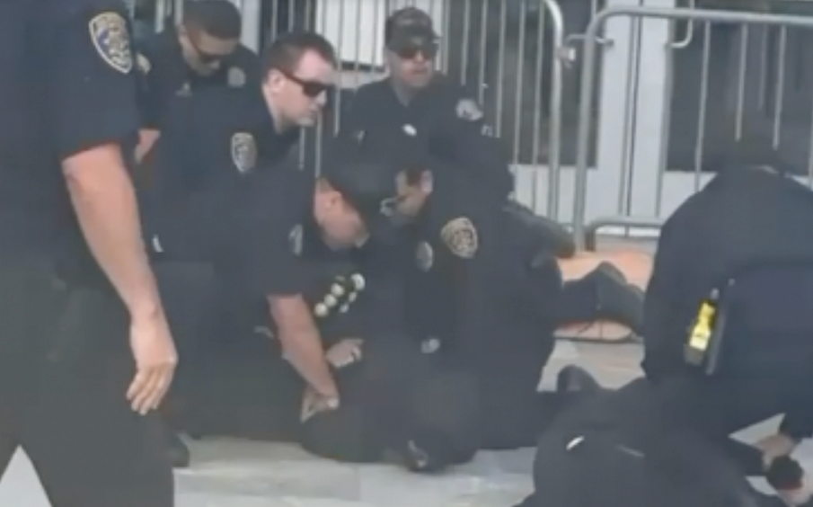 Cal Poly protestors attempt to break into building, start riot – video