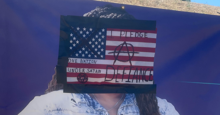 Campaign sign defaced with anti-American flag rhetoric