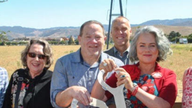 Whom did Derek Johnson serve, San Luis Obispo or Adam Hill?