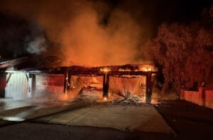 Firefighters battle house fire near Paso Robles